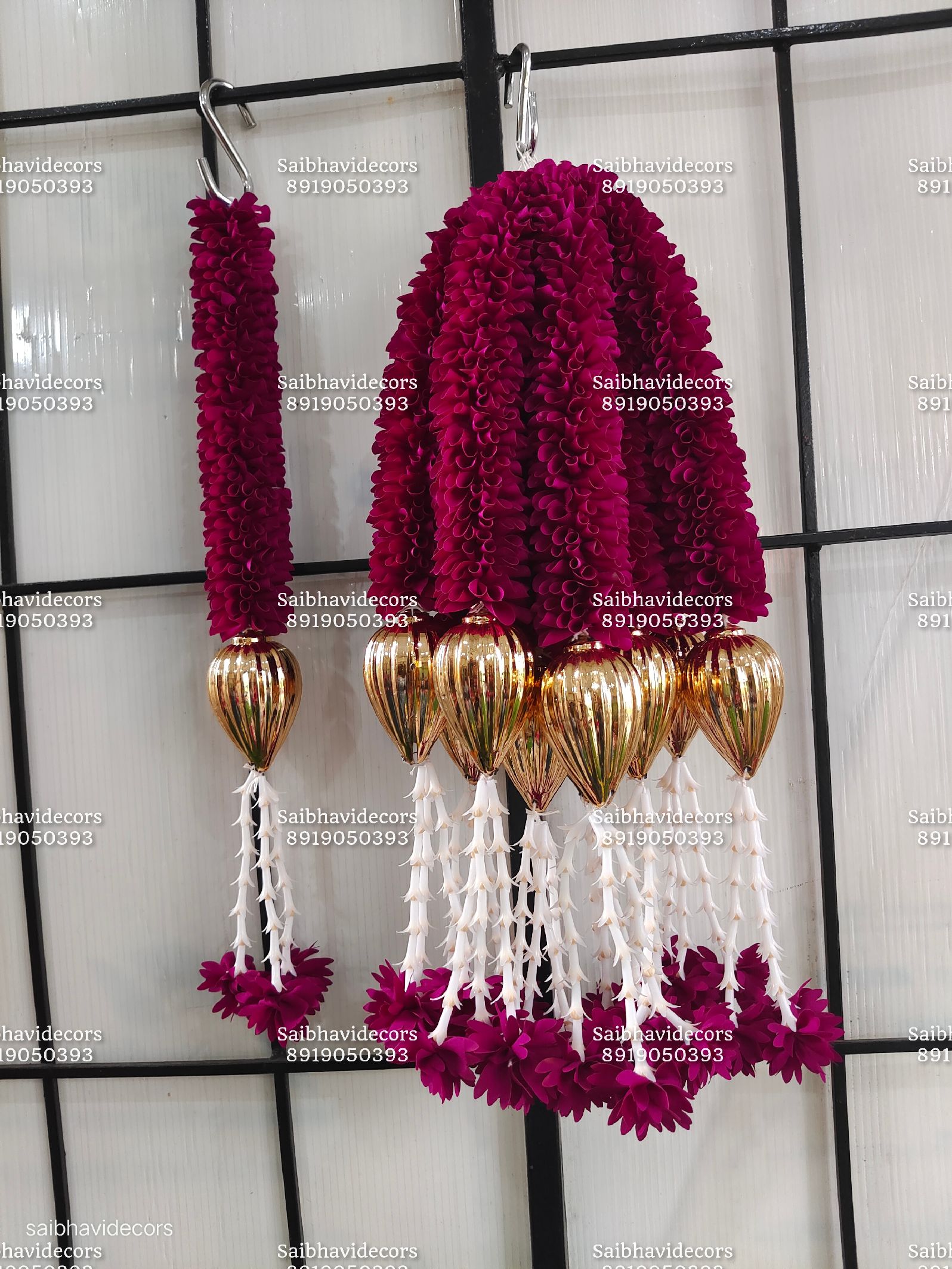 purple strings with gold lotus drops | Sai Bhavi Decors